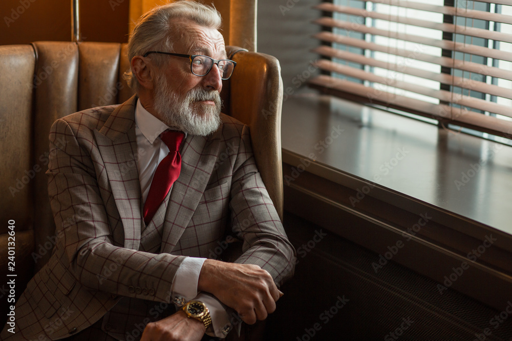 Grey haired old male business owner dressed in formal wear and ...