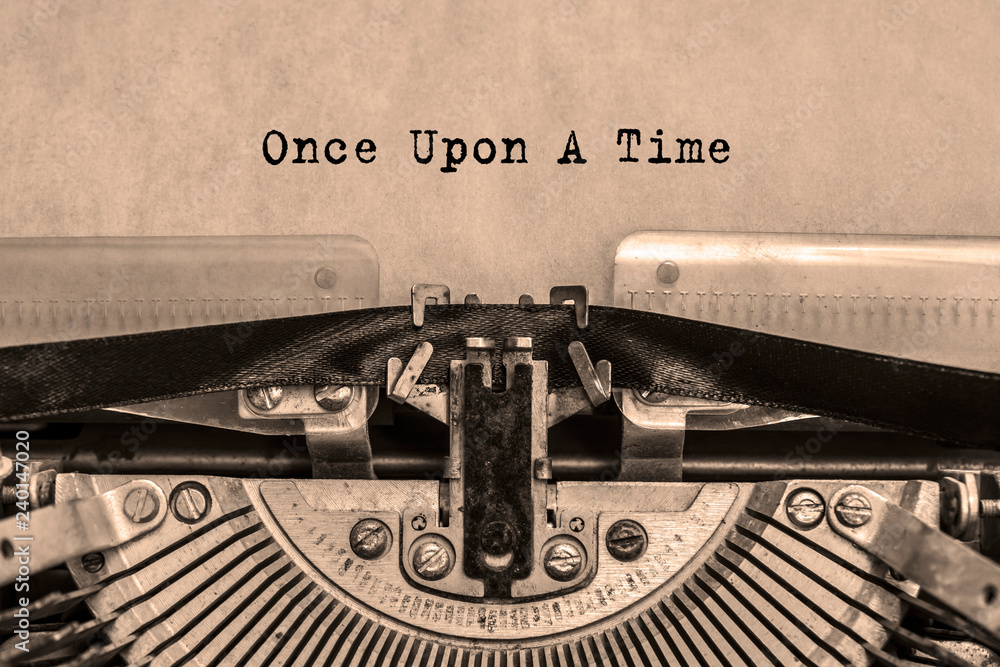 once upon a time printed on a sheet of paper on a vintage typewriter ...