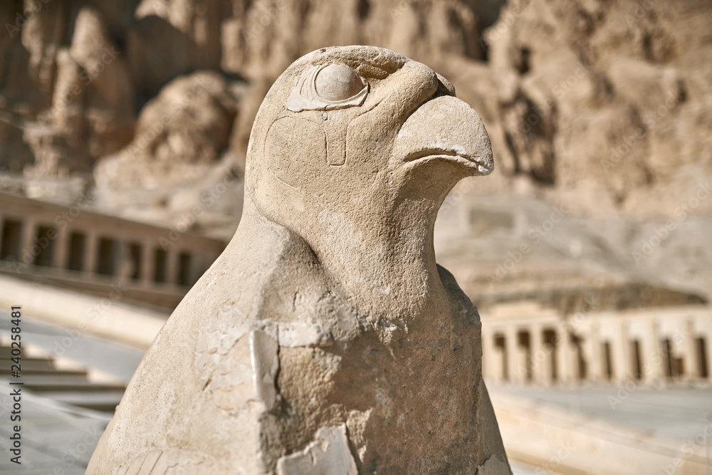 Ancient egyptian sculpture of god Horus in form of falcon in Luxor ...