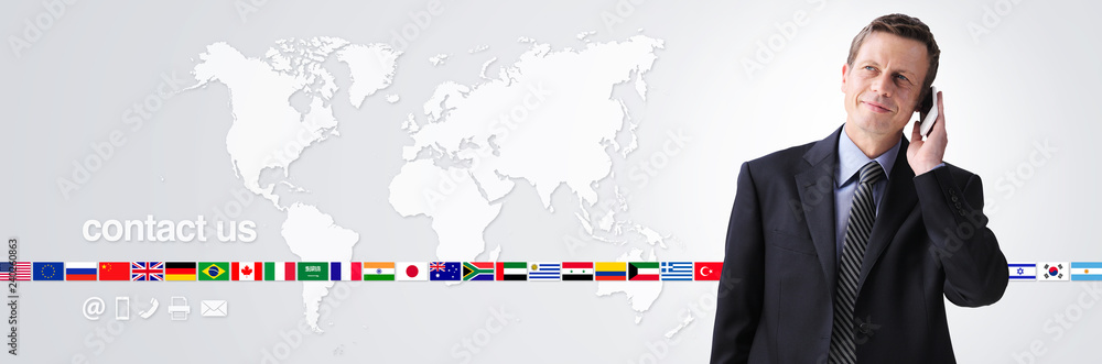 international contact us concept, businessman with mobile phone ...