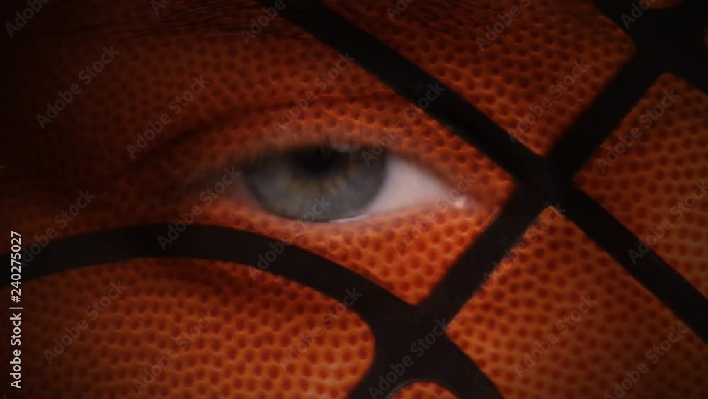 Basketball Fan Eye 4K features a close-up on the eye of a male face ...