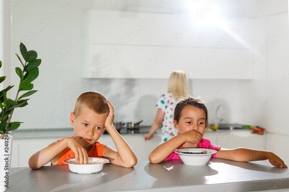 Happy young family, mother with two children, adorable toddler girl and ...