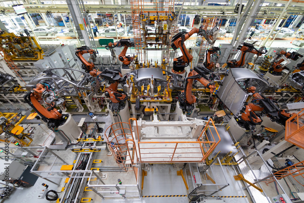 body of car on conveyor top view. Modern Assembly of cars at the plant ...