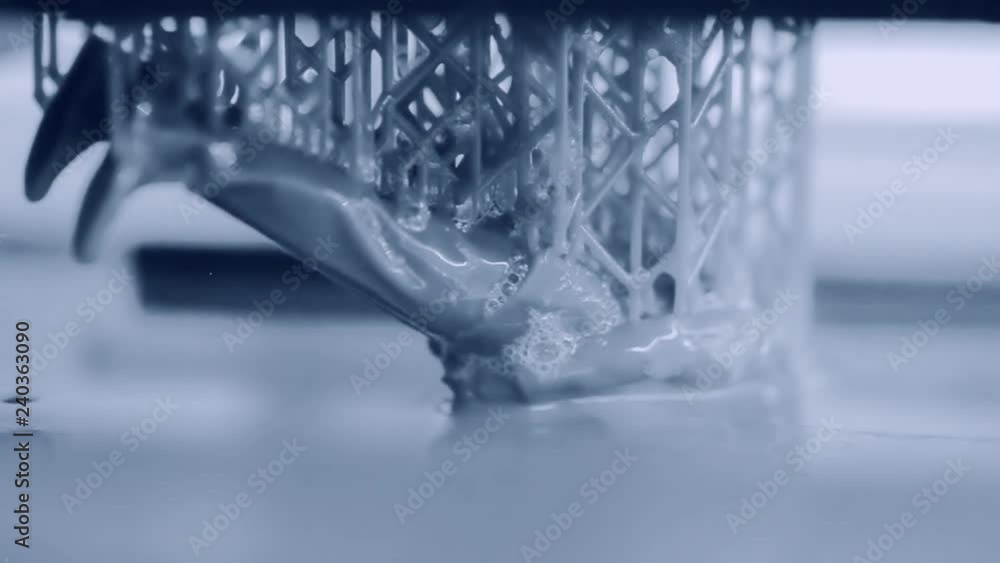 Stereolithography DPL, SLA 3d printer creating shape by UV ...