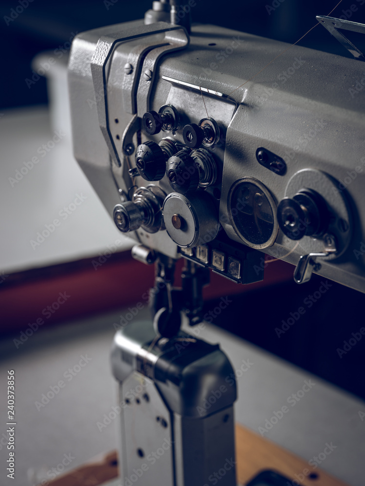 Mechanism of industrial sewing machine Stock Photo | Adobe Stock
