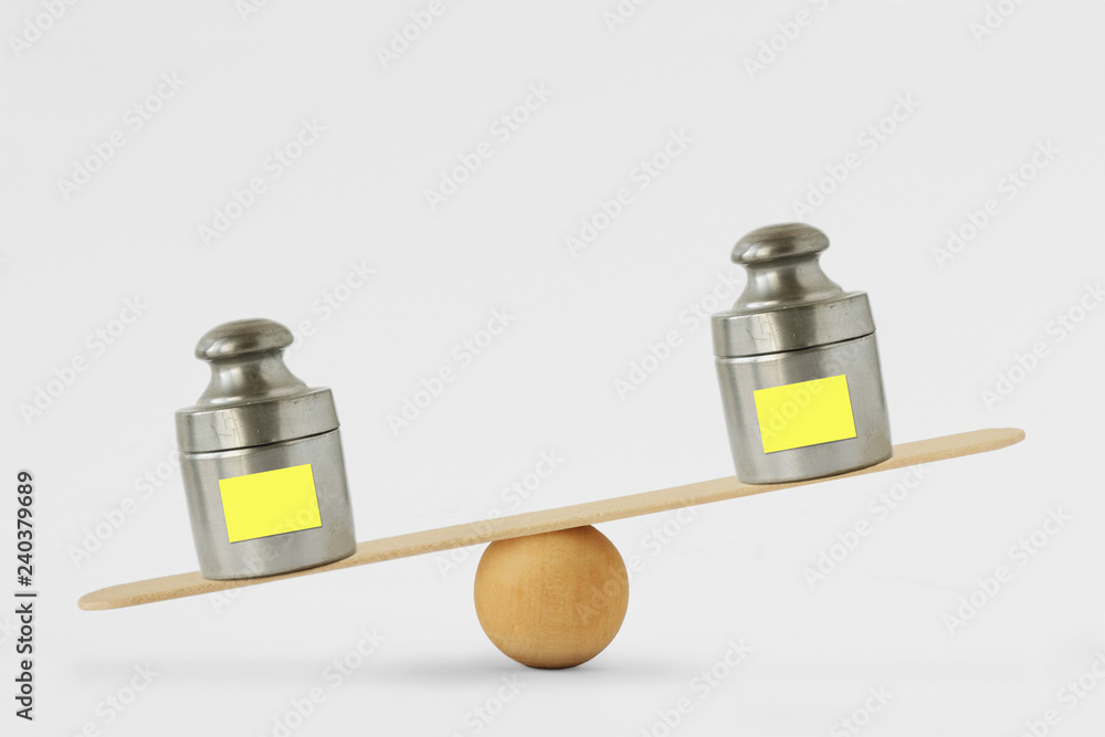 Weights with blank paper note on balance scale - Concept of imbalance ...