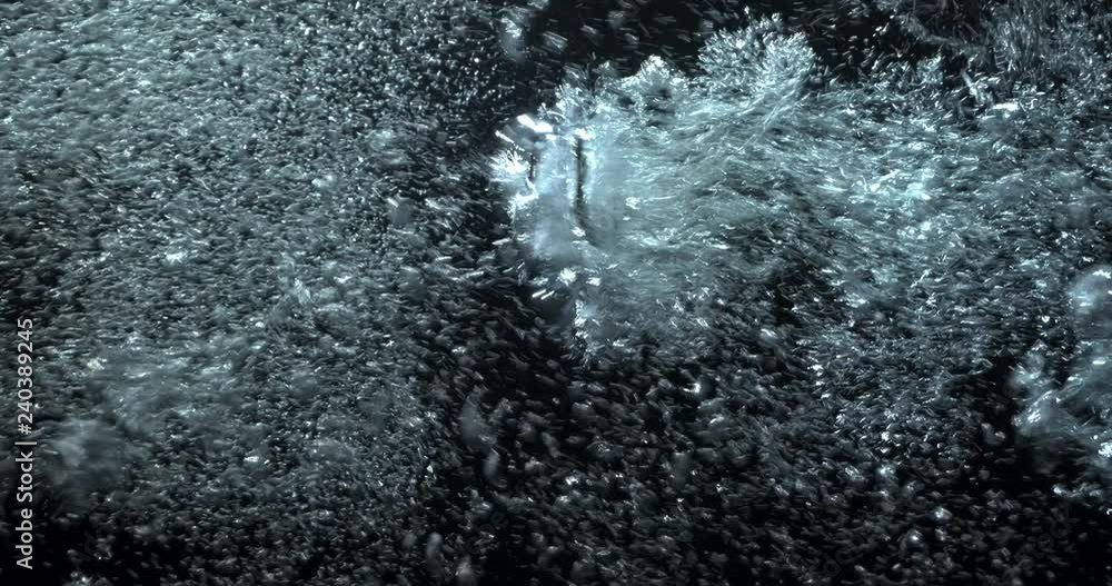 4K underwater illuminated bubbles motion. Ocean floor bubbles. Real ...