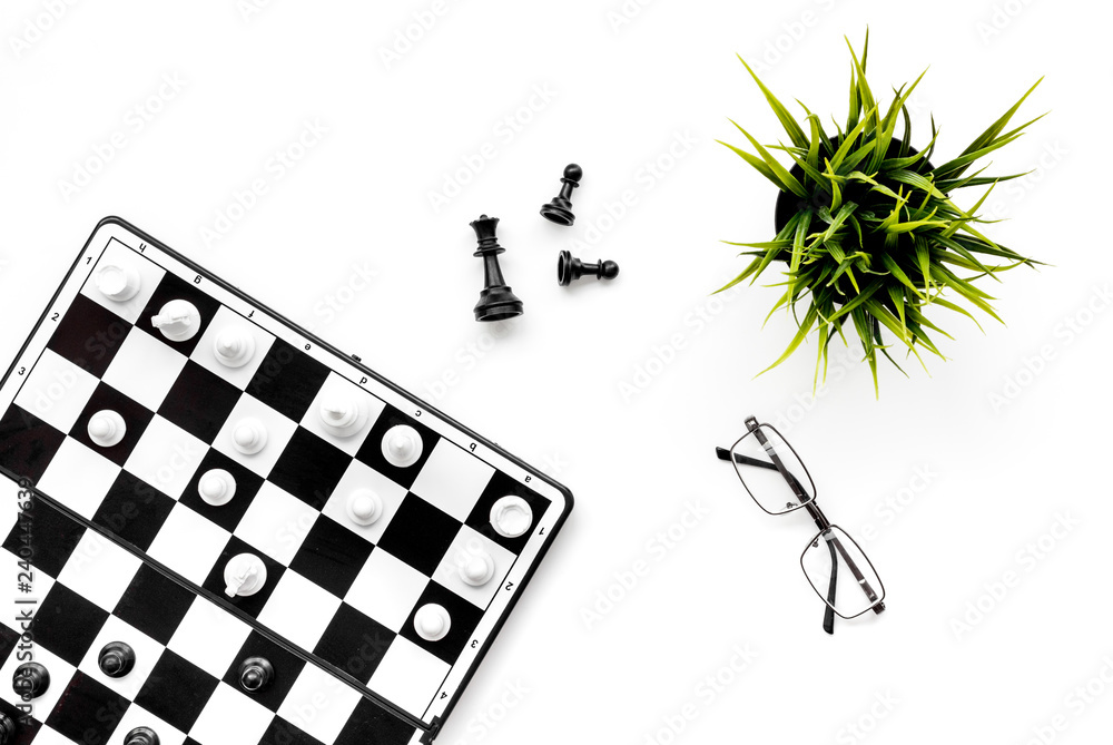 Chess as symbol of business competition. Chess board with figures near ...