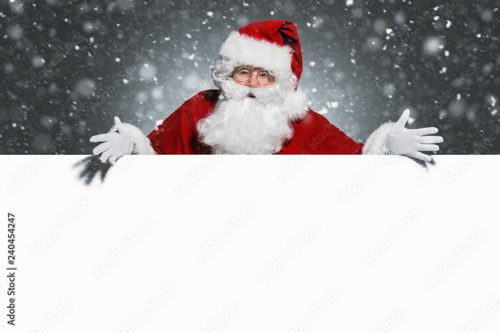 santa behind wall Stock Photo | Adobe Stock