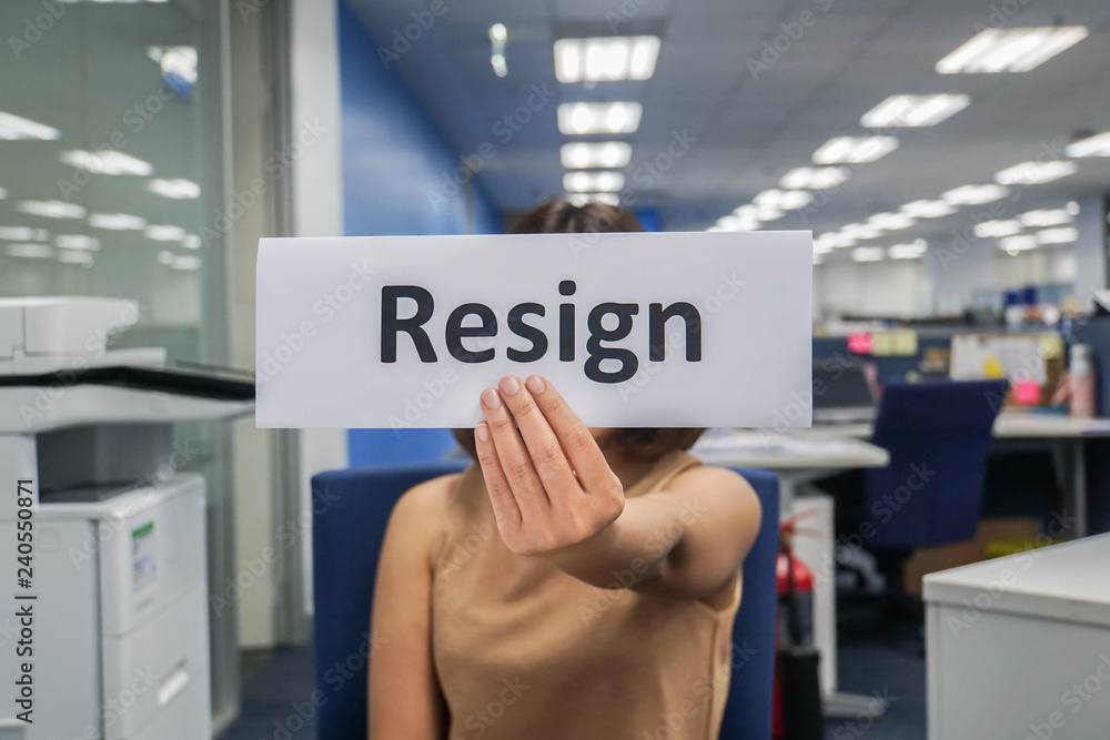 woman submit a resignation letter in office at the end of the year ...
