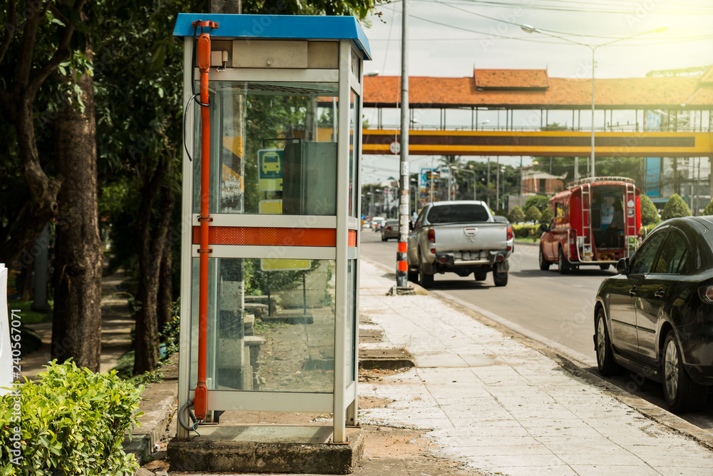 Old telephone booths that are on the side of the road Stock Photo ...