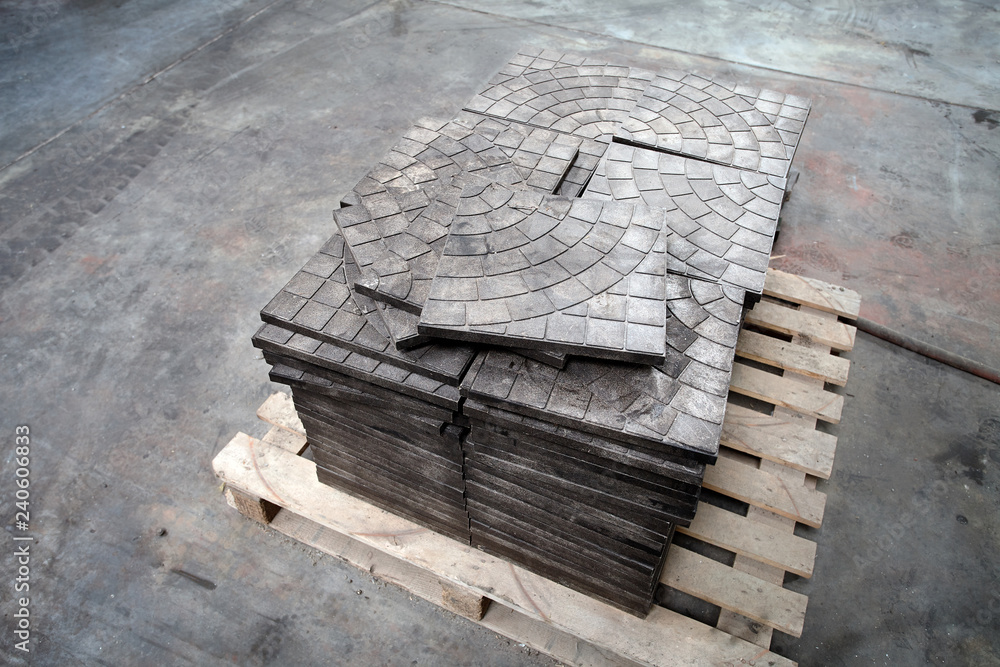 Modern waste sorting and recycling plant, pallet of tiles made out of ...