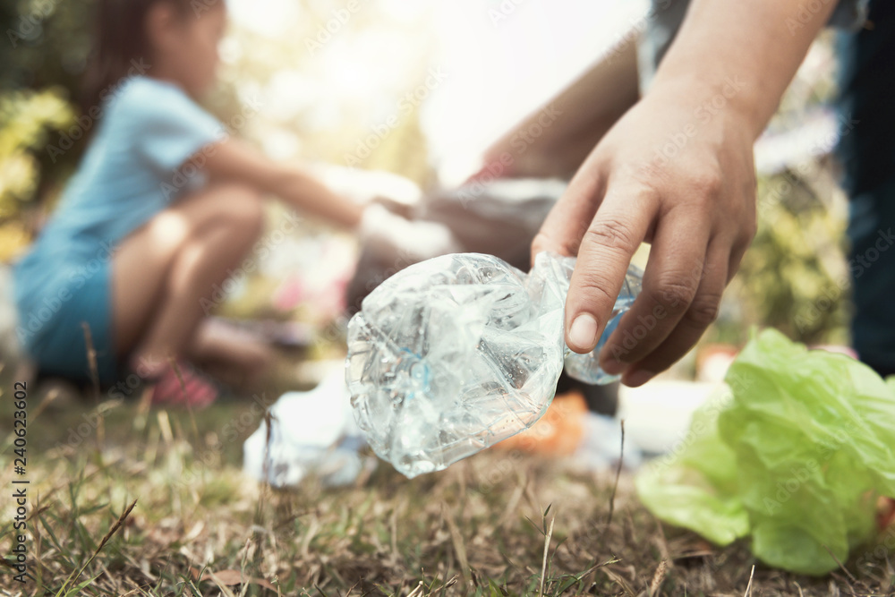 Hand Picking Up Trash