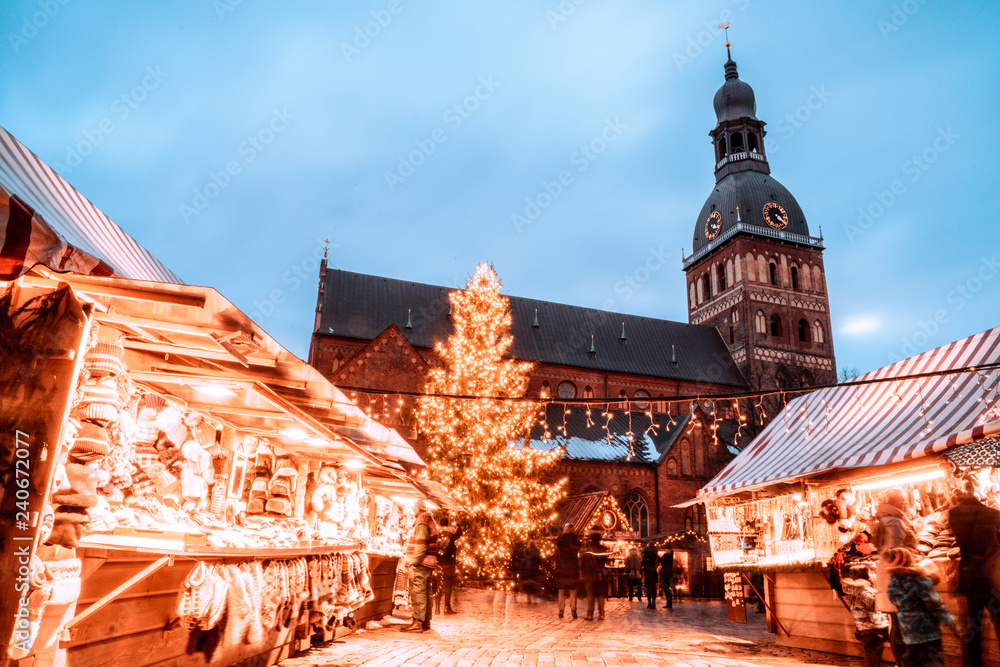 Christmas market and the main Christmas tree located at the Dome square ...
