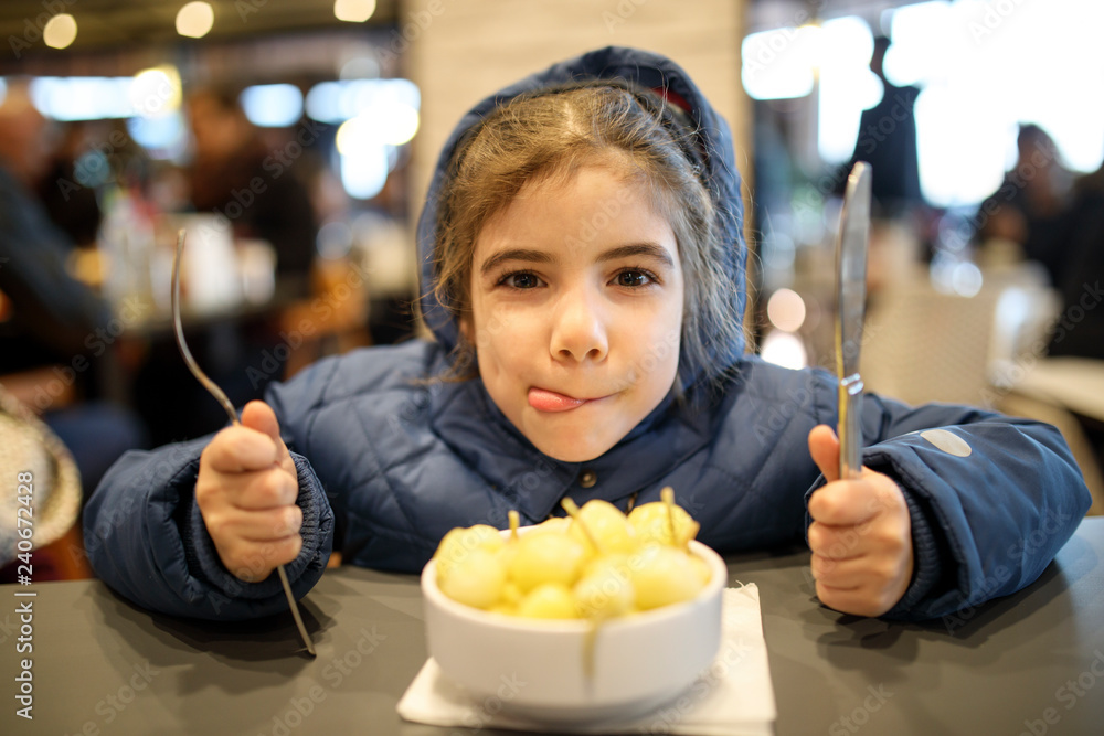 Little Girl Eating Stock Photo | Adobe Stock