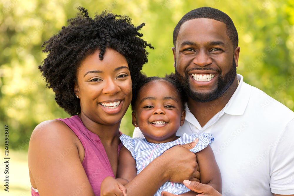 Happy African American family laughing and smiling. Stock Photo | Adobe ...