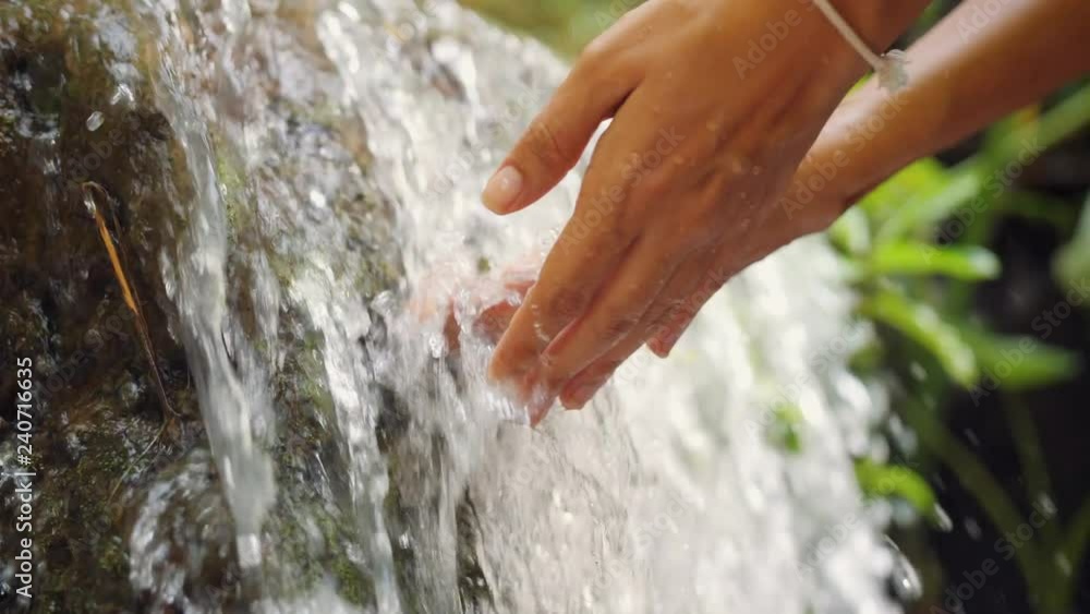 Female Hand Touching Fresh Clean Natural Spring Waterfall in Jungle ...