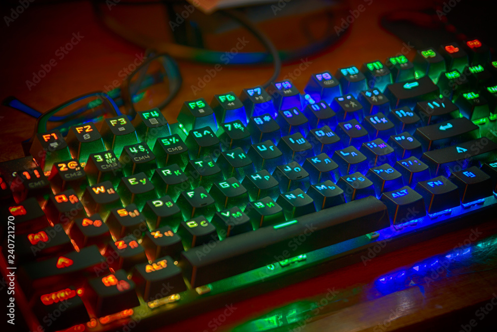Backlit dusty keybord with colorful led rgb buttons, look like modern ...
