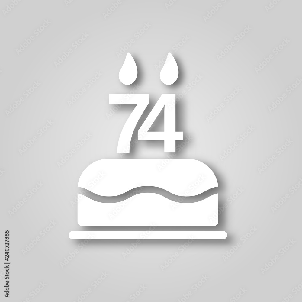 Birthday cake with candles in the form of the number 74 figure cut out ...