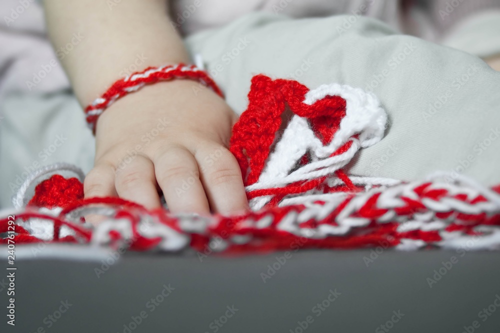 Martenitsa, white and red strains of yarn, Bulgarian folklore tradition ...