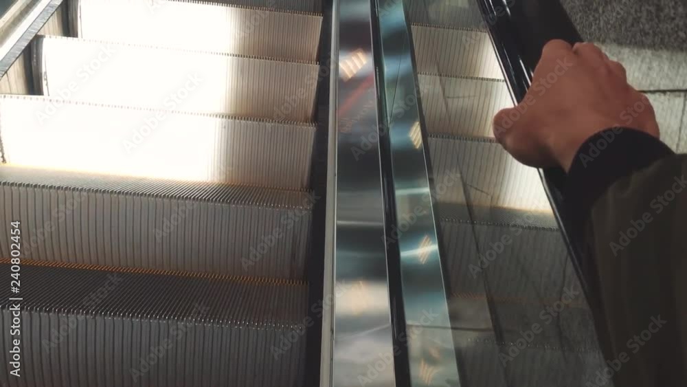 Vidéo Stock hands on Escalator to a better future metro underground ...