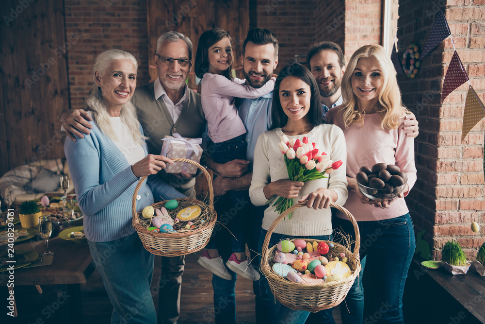Foto de Close up photo of people gathered family cuddle each other ...