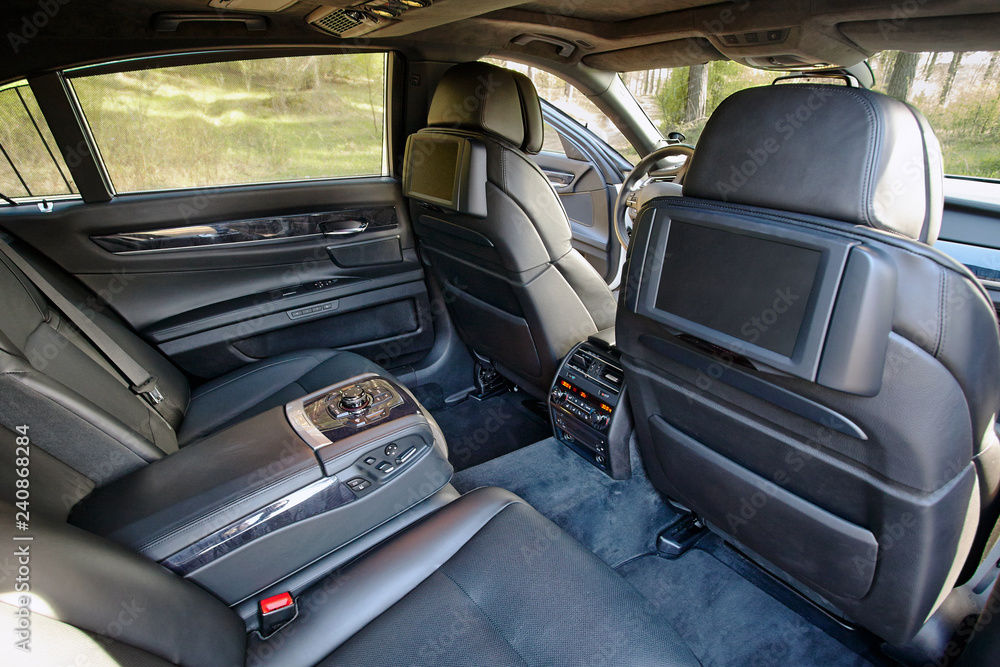 Car inside. Interior of prestige luxury modern car. Two displays for ...