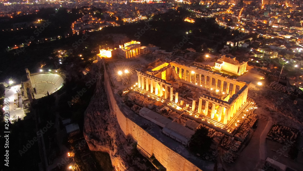 Aerial drone detail night shot of iconic Acropolis hill and the Parthenon a masterpiece of ...