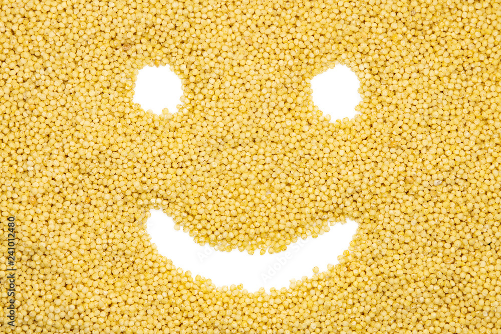 Millet groats, funny smile face, close up, top view. Gluten-Free and ...