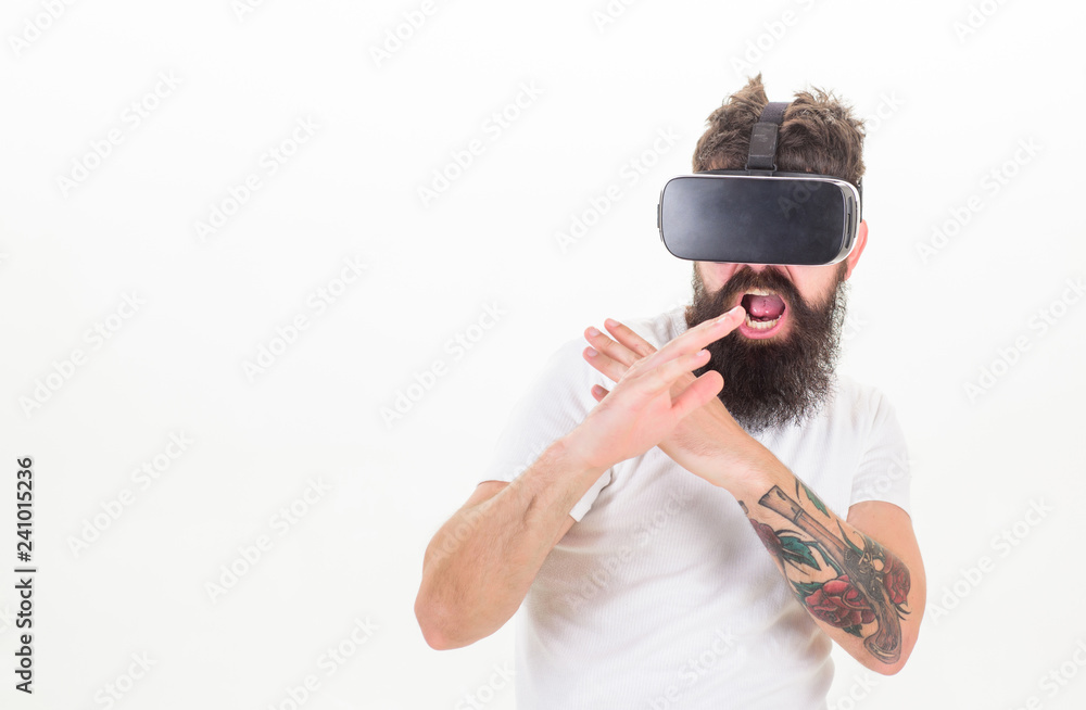 Hipster play virtual sport game. Man bearded gamer VR glasses white background. Virtual reality ...