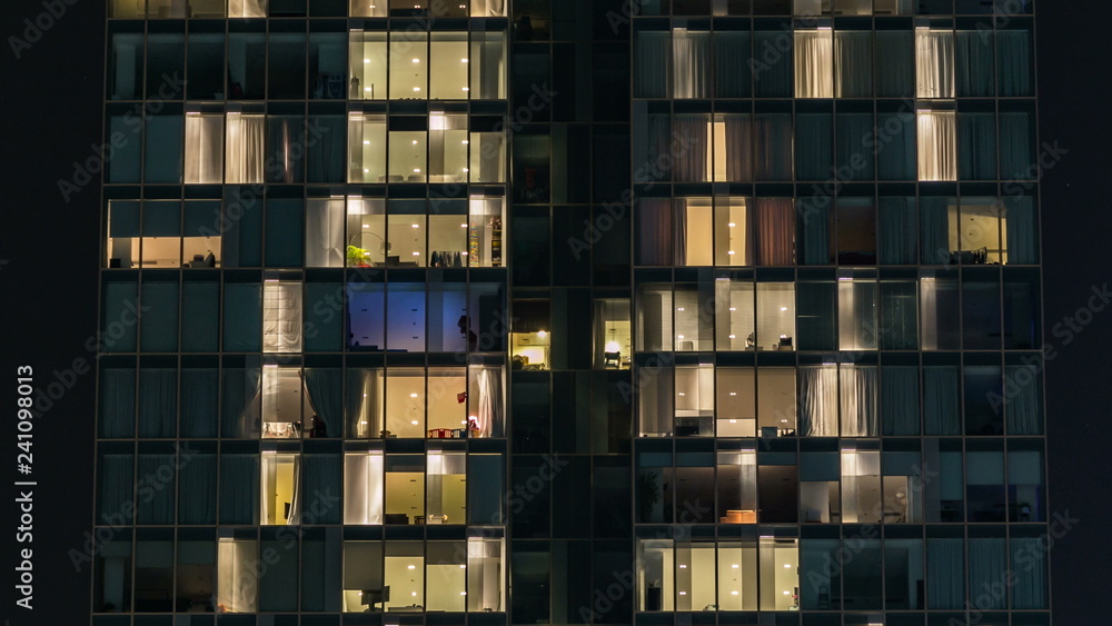 window of the multi-storey building of glass and steel lighting and ...