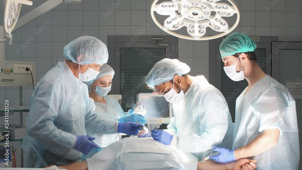 Modern hospital operating room with steel sterile medical instruments ...