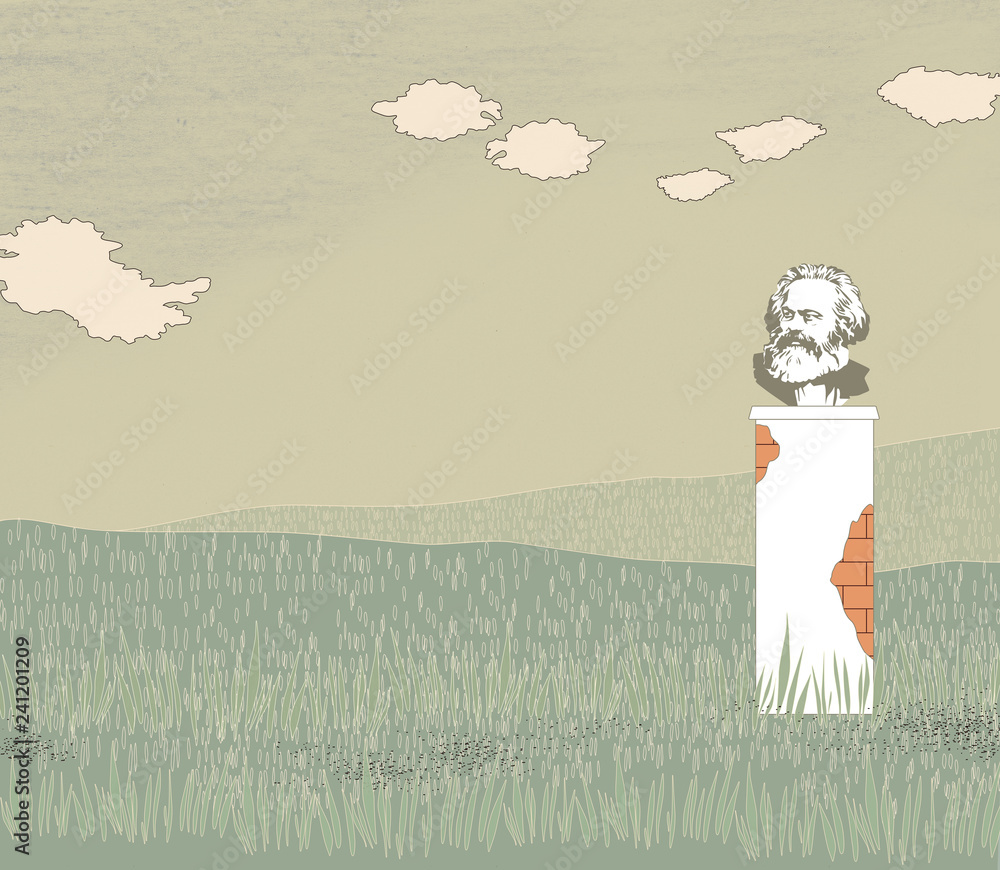 Bust of Karl Marx on the background of a summer green field under the ...