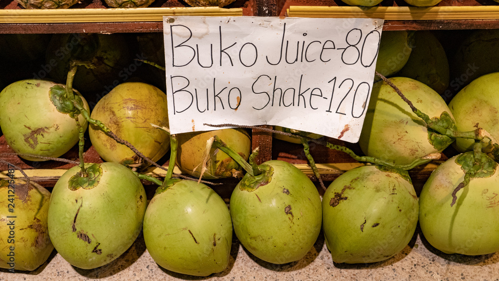 Buko(coconut) in a wooden shelf, local food market, bohol island, cebu ...