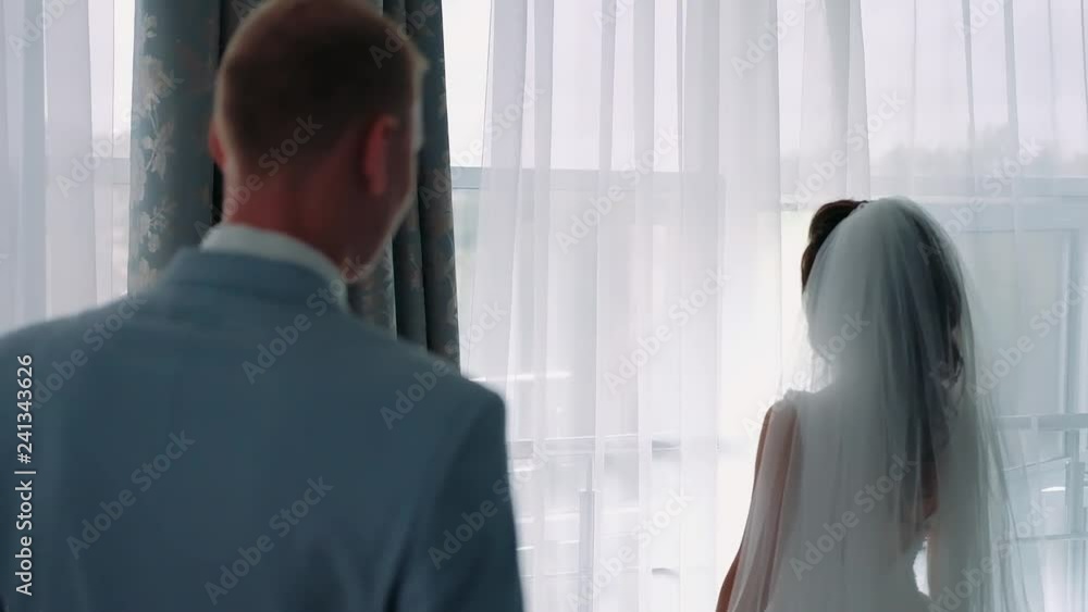 Groom meets happy bride first time seeing her in wedding dress ...