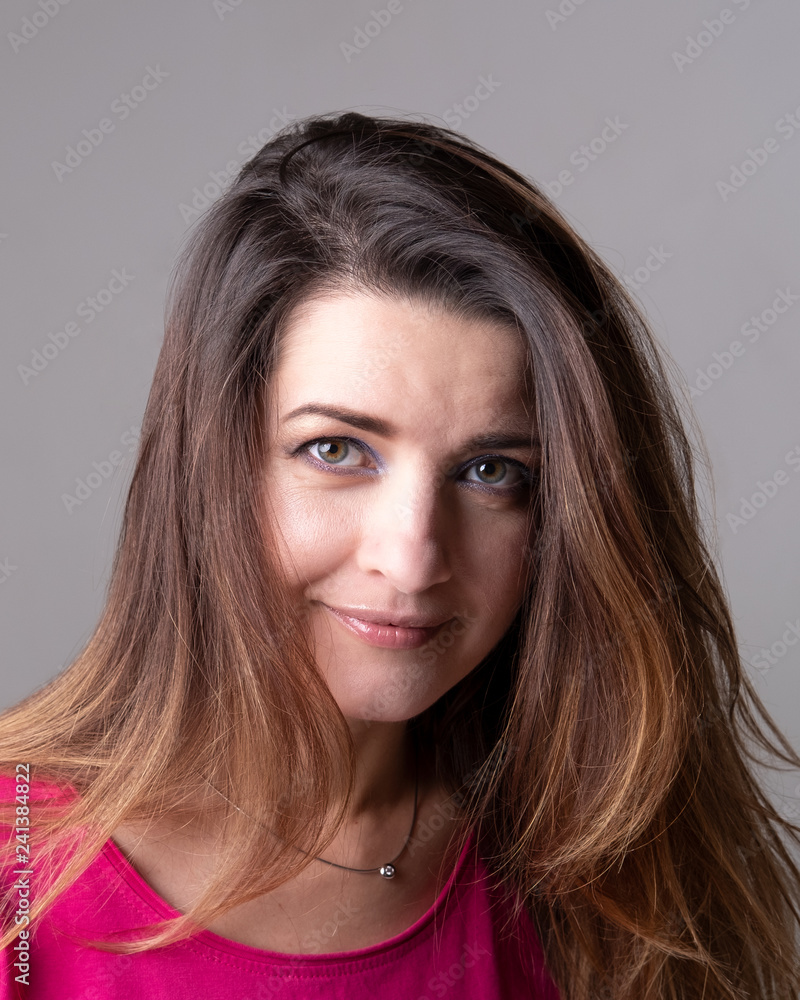 girl model in pink shirt in Studio on light background Stock Photo ...