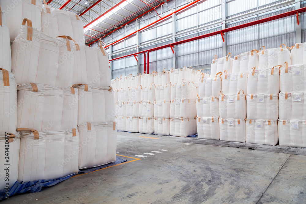 Stacking of bulk cargo in jumbo bags are store in warehouse for ...