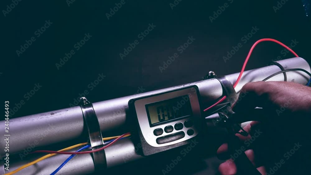 Hand chooses and cuts wire to defuse pipe bomb with clock timer ...