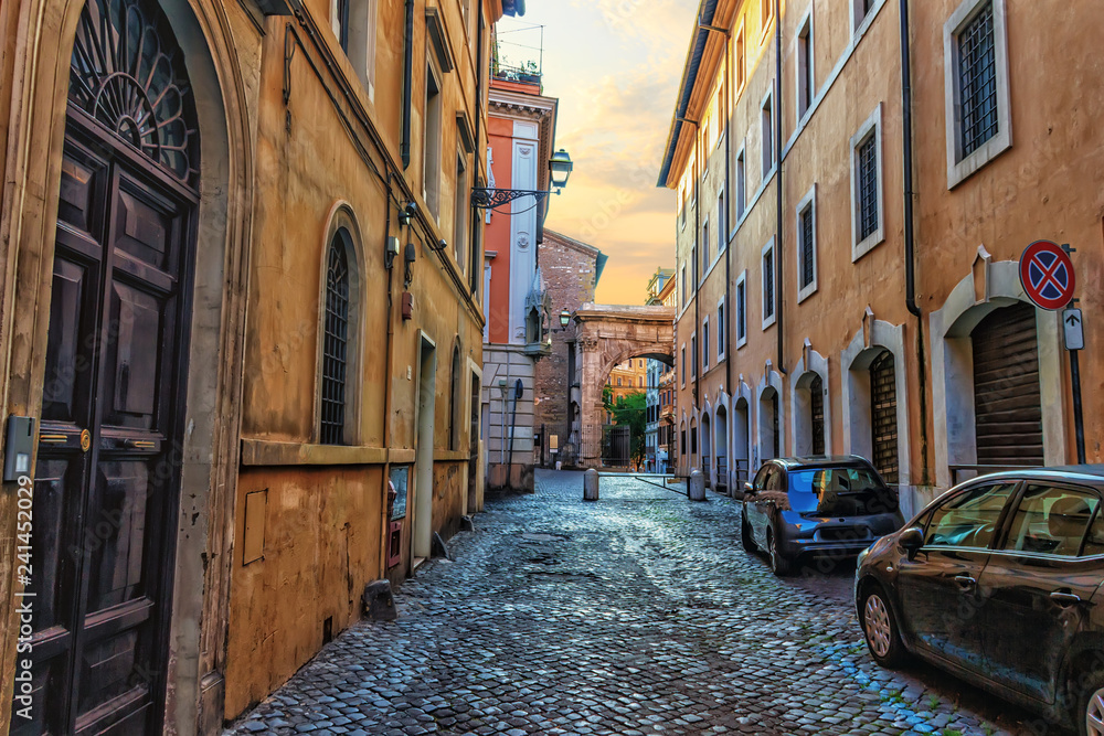Traditional Rome street in the centre, stone pavement and ancien Stock ...