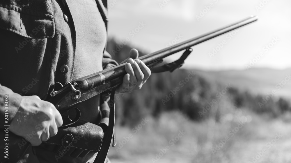 Hunter with horizontal double-barreled shotgun on hunting Stock Photo ...