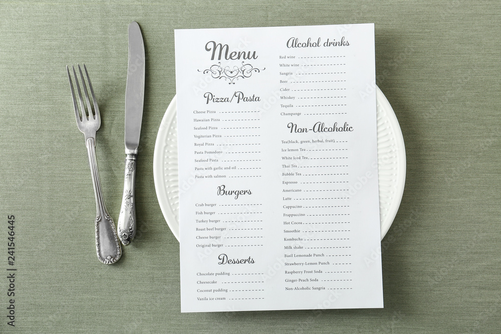 Menu on served table in restaurant Stock Photo | Adobe Stock