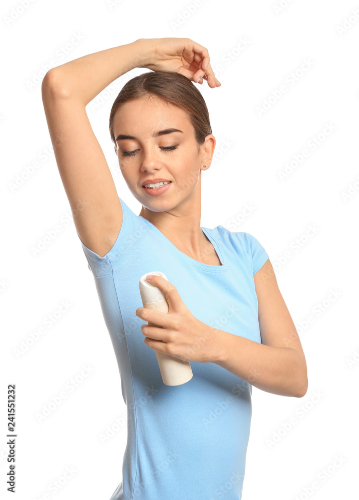Beautiful young woman with deodorant on white background Stock Photo ...