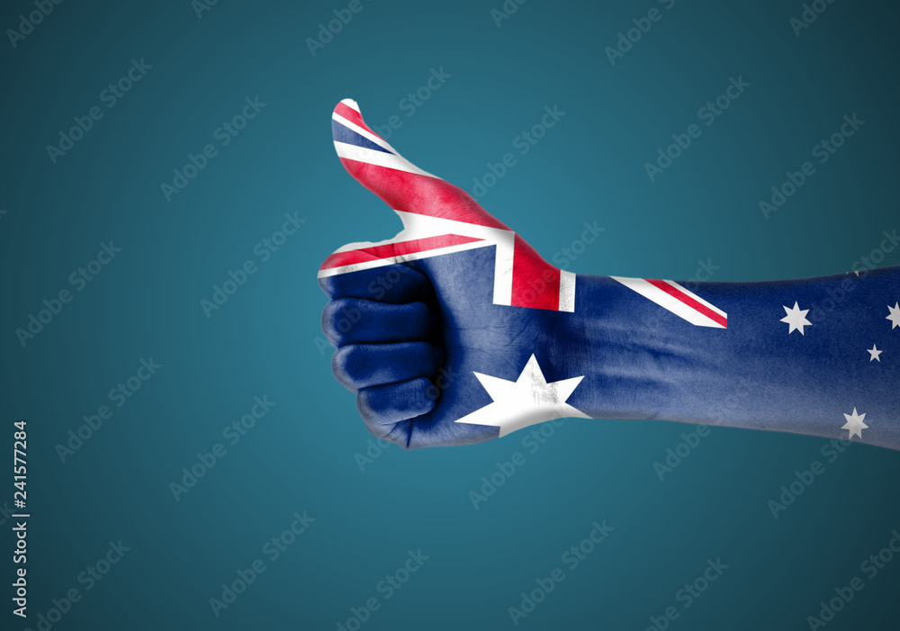 National flag of Australia painted in the hands of people with closed ...
