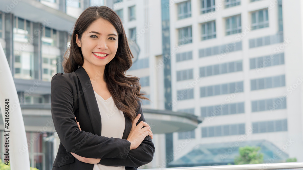 smart business girl thinking and city background Stock Photo | Adobe Stock