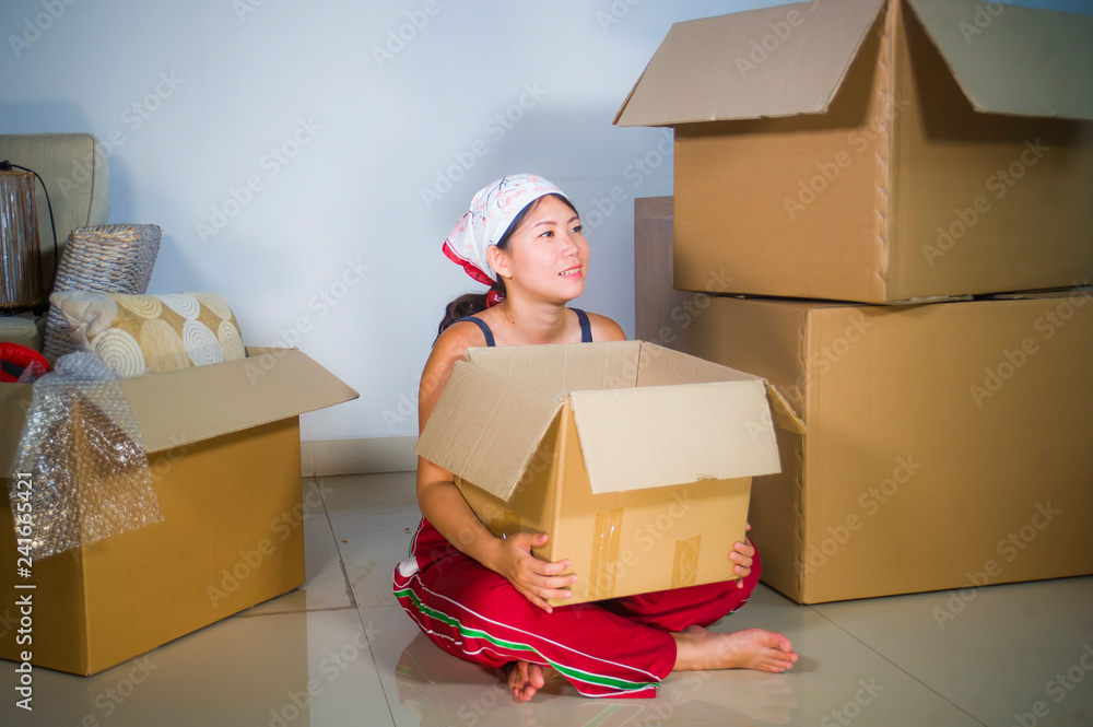 young beautiful and happy Asian Korean woman excited at home living ...