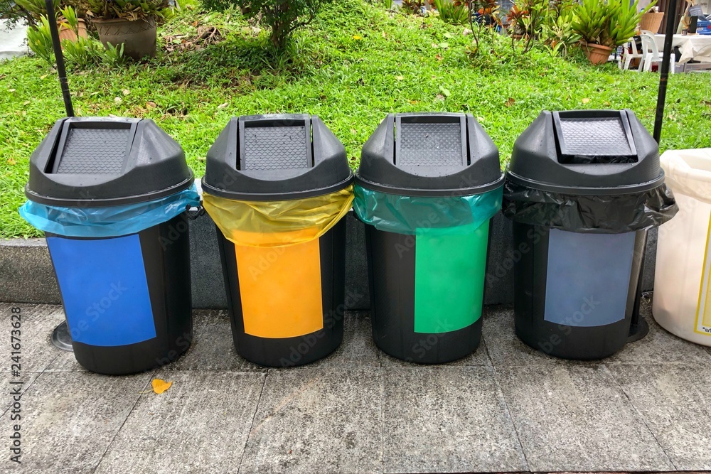 Difference Colored Bins For Collection Of Recycle Materials Stock Photo ...