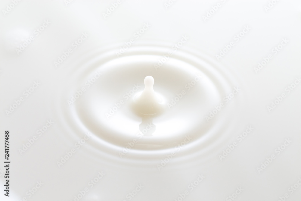 Simple Drop of Milk into a Bowl of Milk Stock Photo | Adobe Stock
