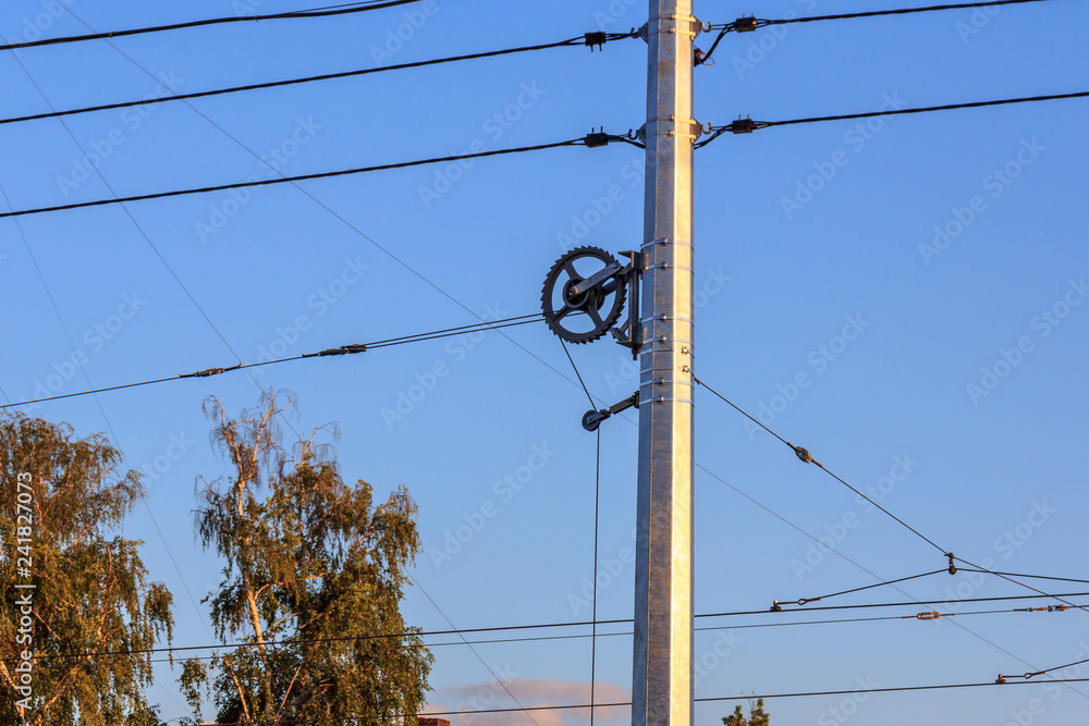 Tram line tensioning system. Compensatory tram contact wires device ...