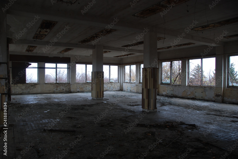 Urbex, dirty hall in abandoned and unfinished building of barracks ...