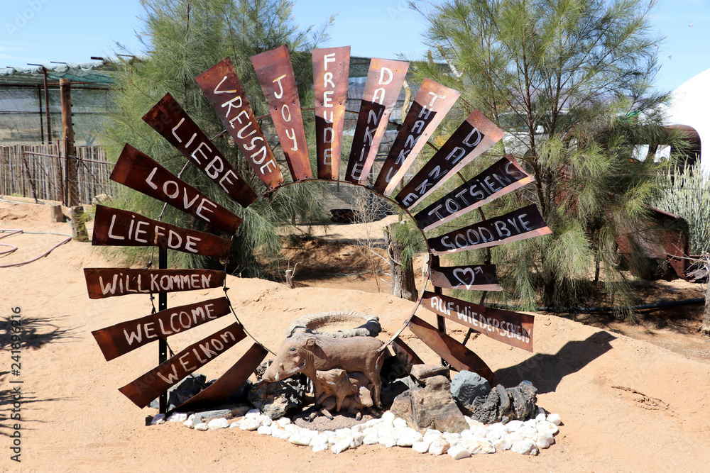 Foto de Welcome and good bye bow in different languages in the desert ...
